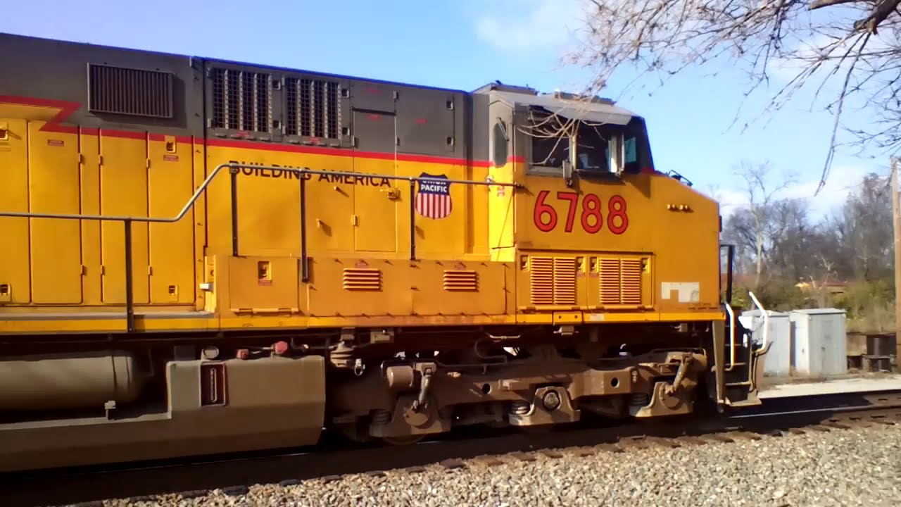 Union Pacific 6788 leads NS 51A with UP and NS power - YouTube