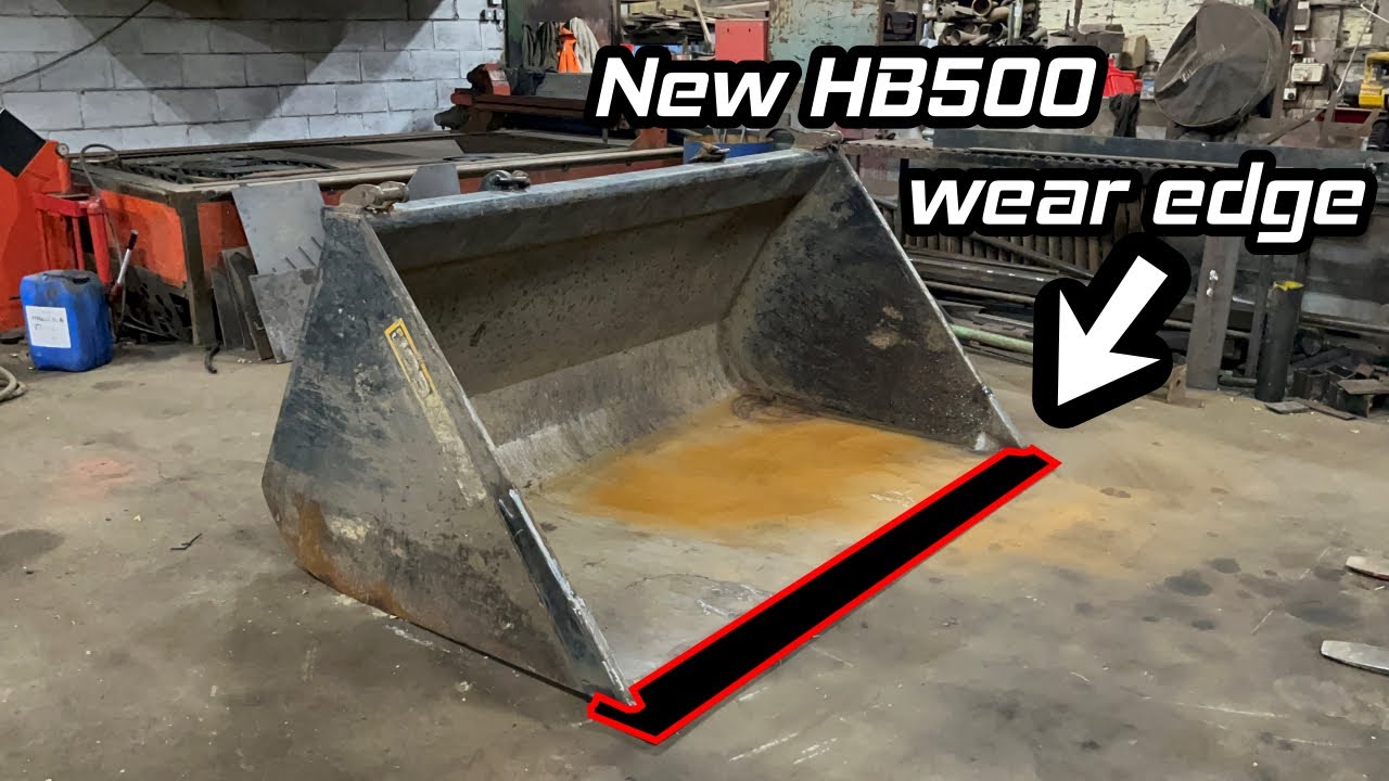 Replacing bucket wear edge and welding up cracks. - YouTube