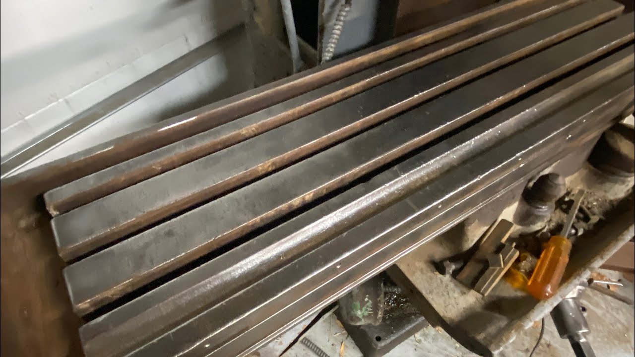 Cleaning up the table on the Cincinnati mill - YouTube