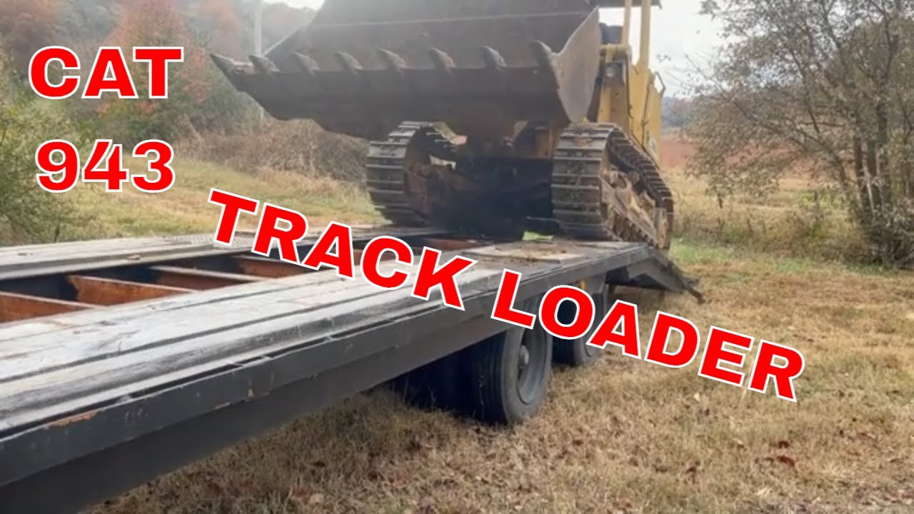 CATERPILLAR 943 TRACK LOADER CLEANING OUT POND! - YouTube