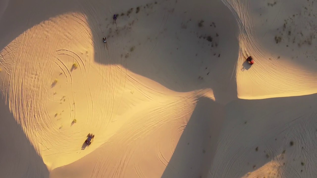 Drone flight over Glamis sand dunes - YouTube