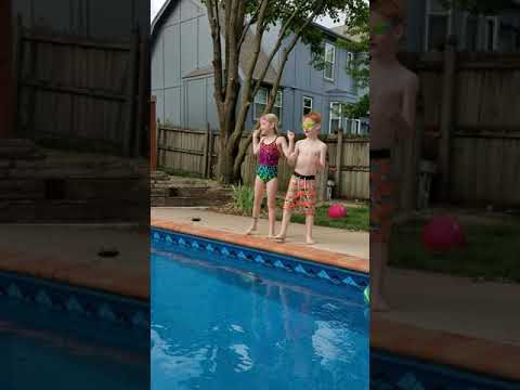 Addison and Owen swimming with jaws