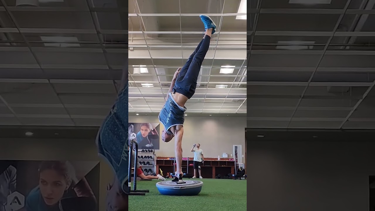 7 shape change one arm handstand on the bosu & Lebert Equalizer ...