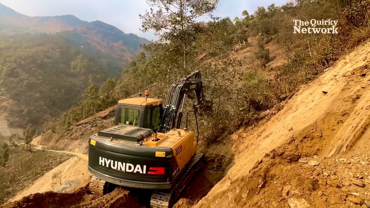 Watch a JCB Excavator Operator Skillfully Push Down a Tree and Cuts a ...