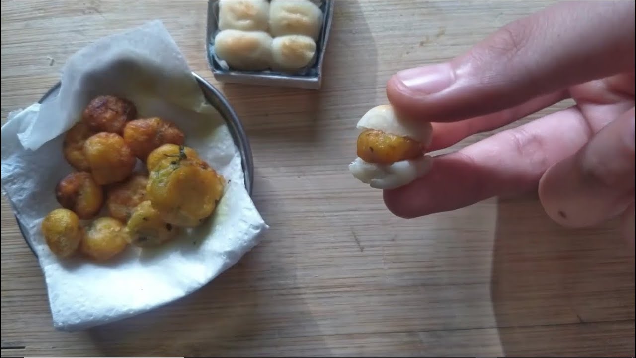 Miniature Vada Pav...Street style vada and pav recipe."Worlds smallest ...