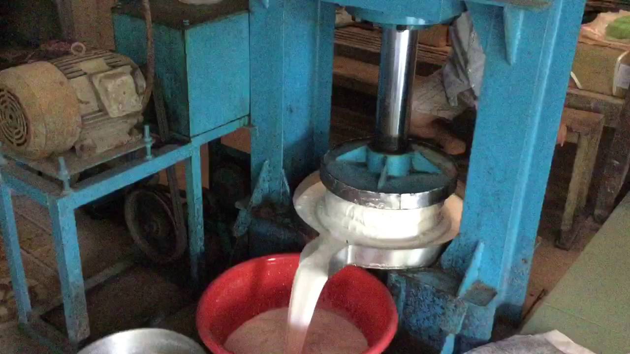 Pressing coconut - YouTube