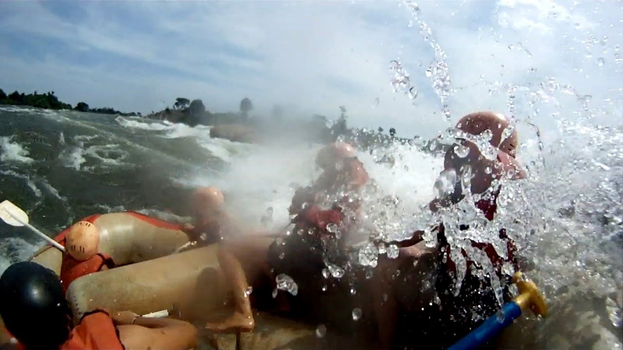 man falling from boat to turbulent river in Uganda - YouTube