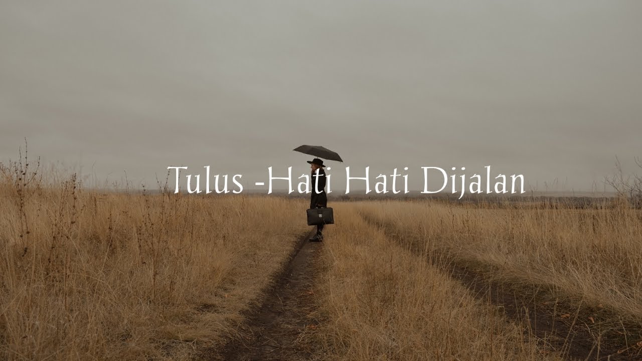 TULUS HATI HATI DIJALAN (Lirik Lagu) - YouTube