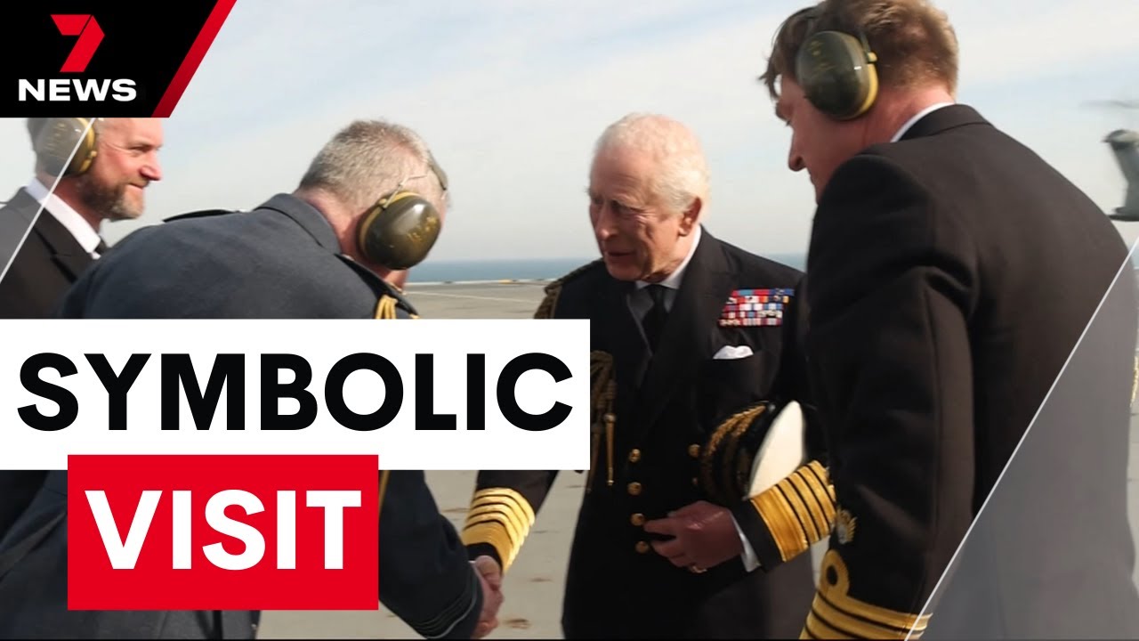 King Charles makes a rare flying visit to troops on an aircraft carrier ...