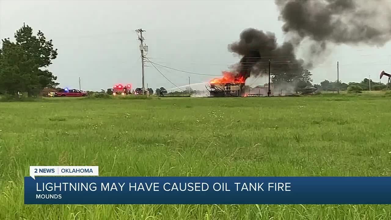 Oil tank catches fire in Mounds, possibly caused by lightning - YouTube