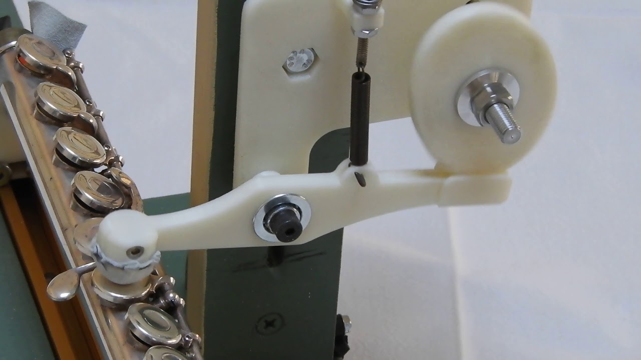 Flute pad testing machine - YouTube