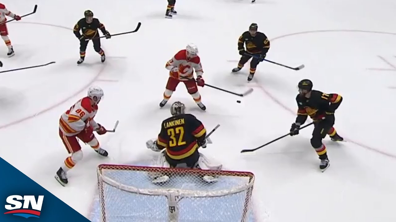 Flames' Yegor Sharangovich Swats Home Third Goal Of Season - YouTube