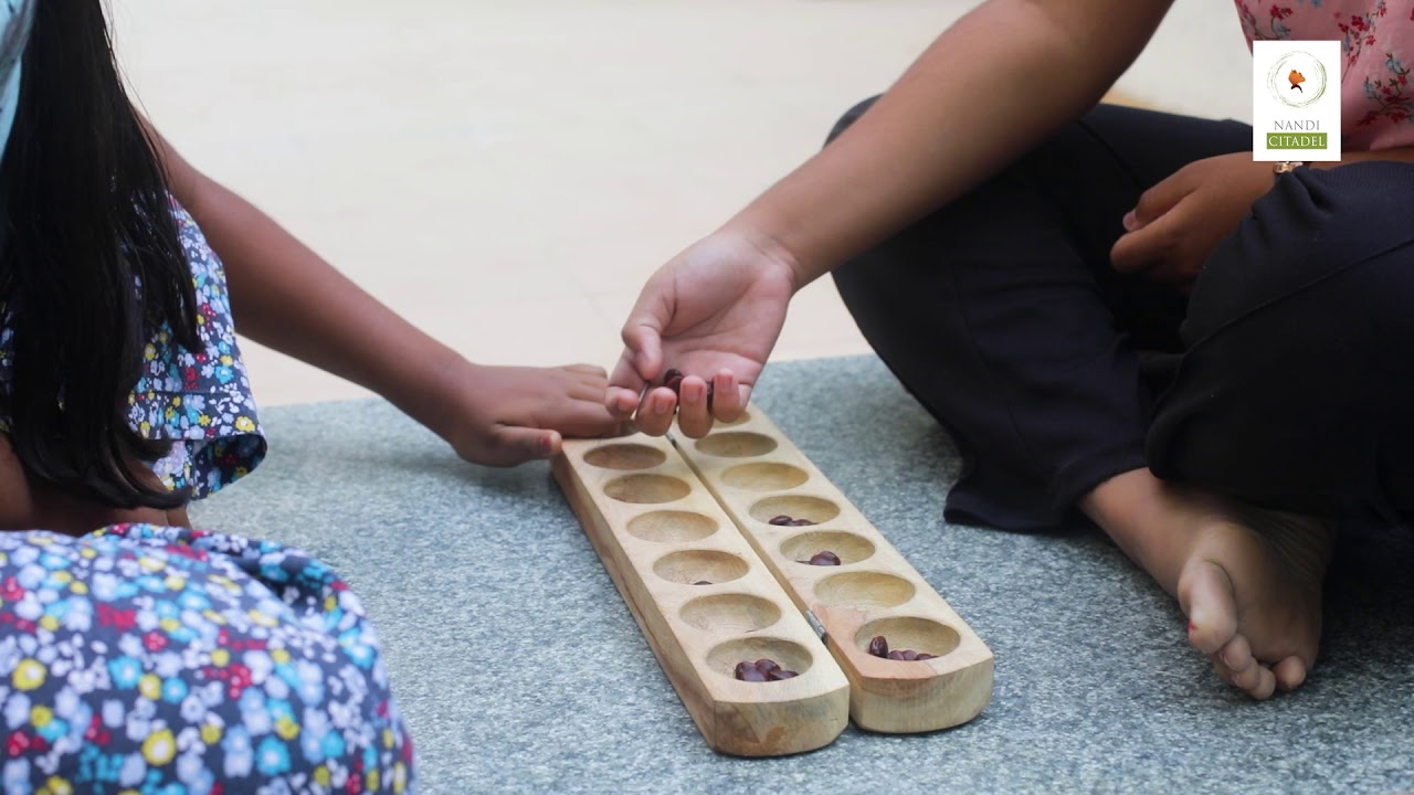 Pallanguzhi- Traditional Games @ Nandi Citadel - YouTube