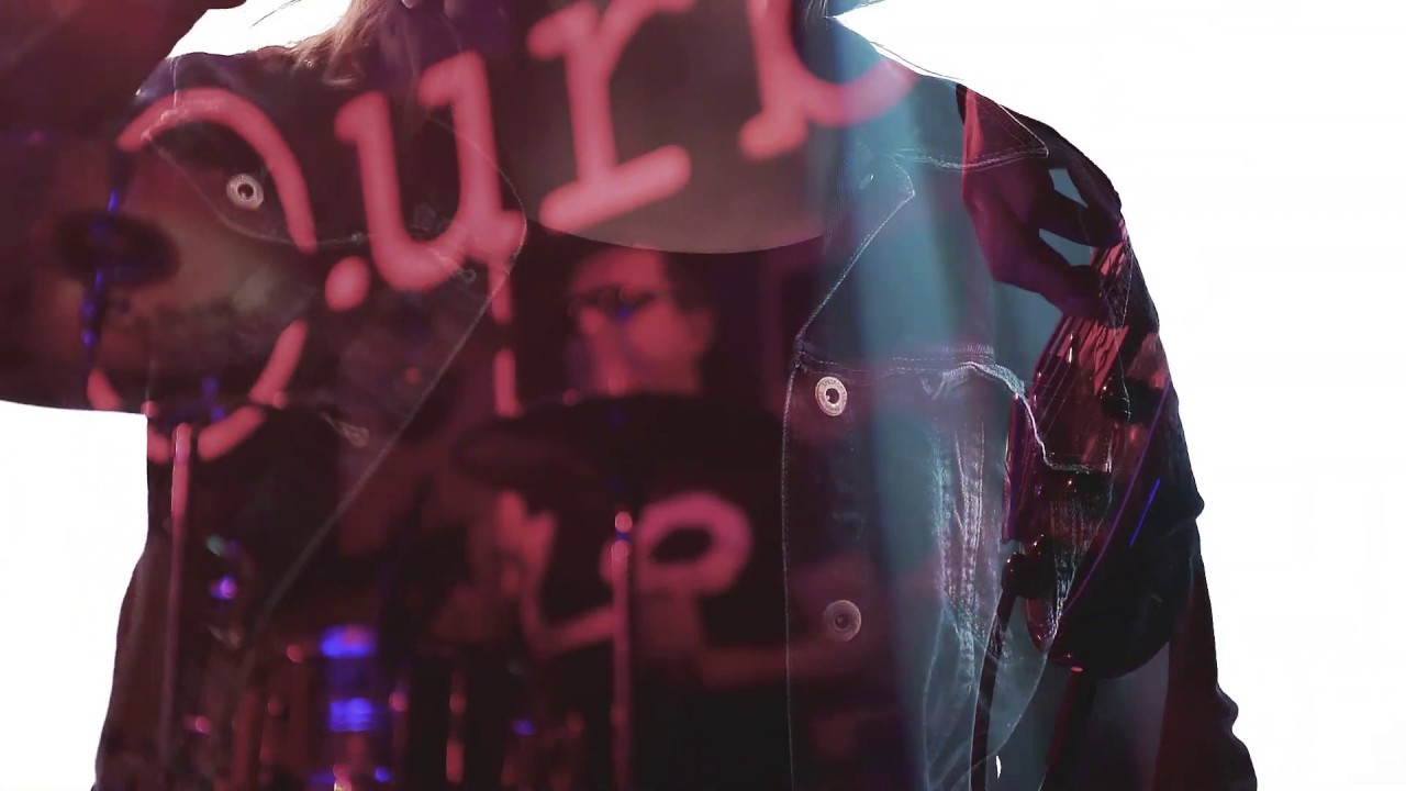 Double exposure video of a man and in exposure playing rock band Free ...