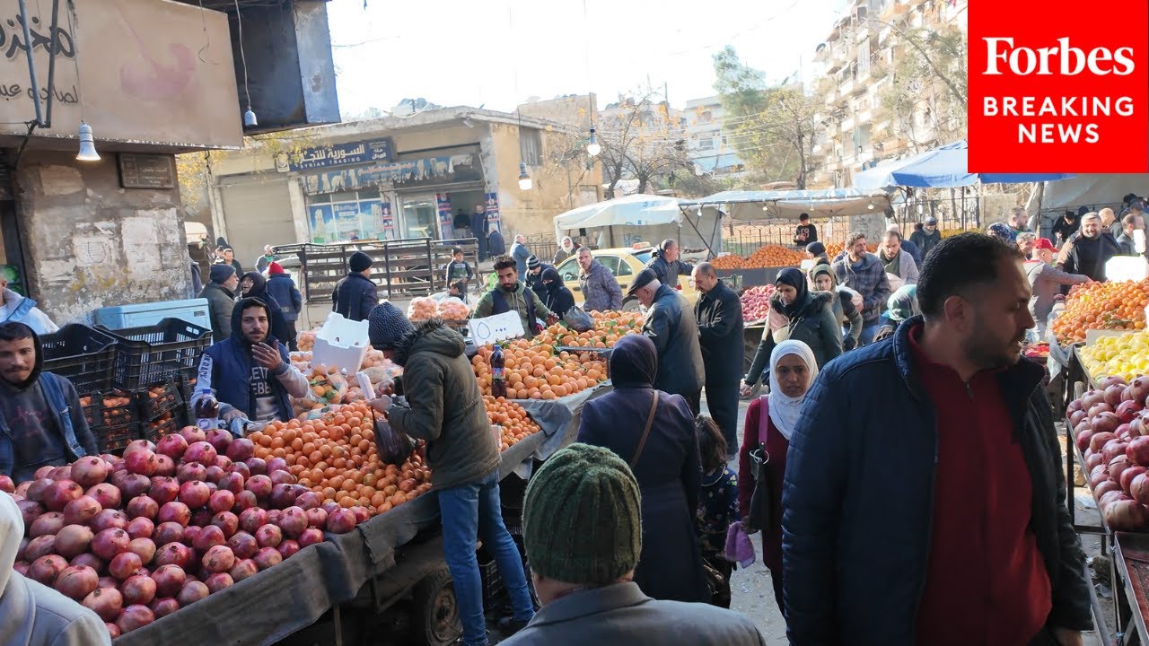 Syrians Shop In Old Town Bazaar In Aleppo, Syria After Collapse Of ...