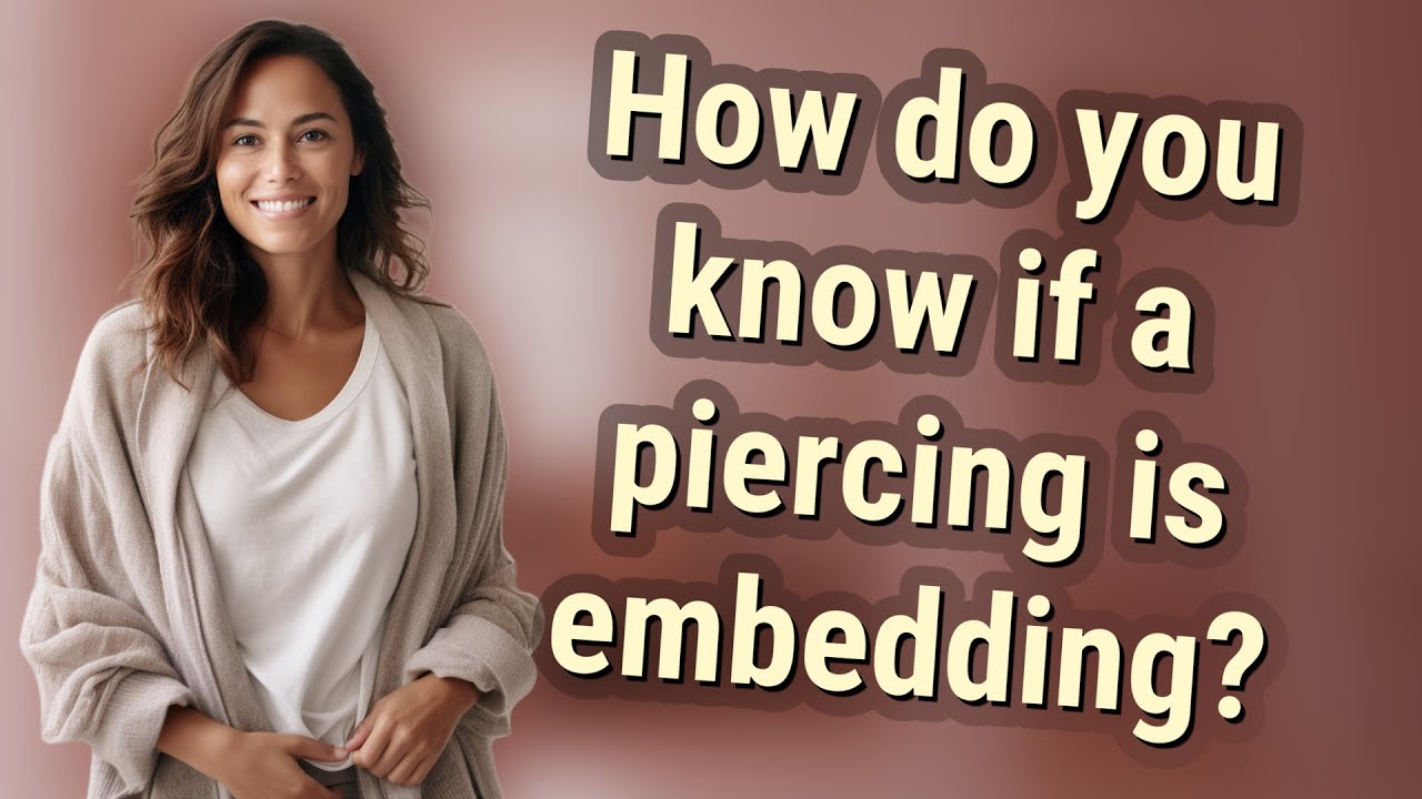 How do you know if a piercing is embedding? - YouTube