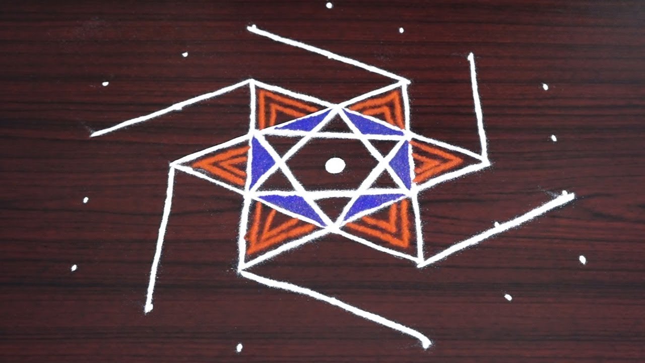 Simple Star rangoli with 7x4 dots - friday kolam designs - star muggulu ...