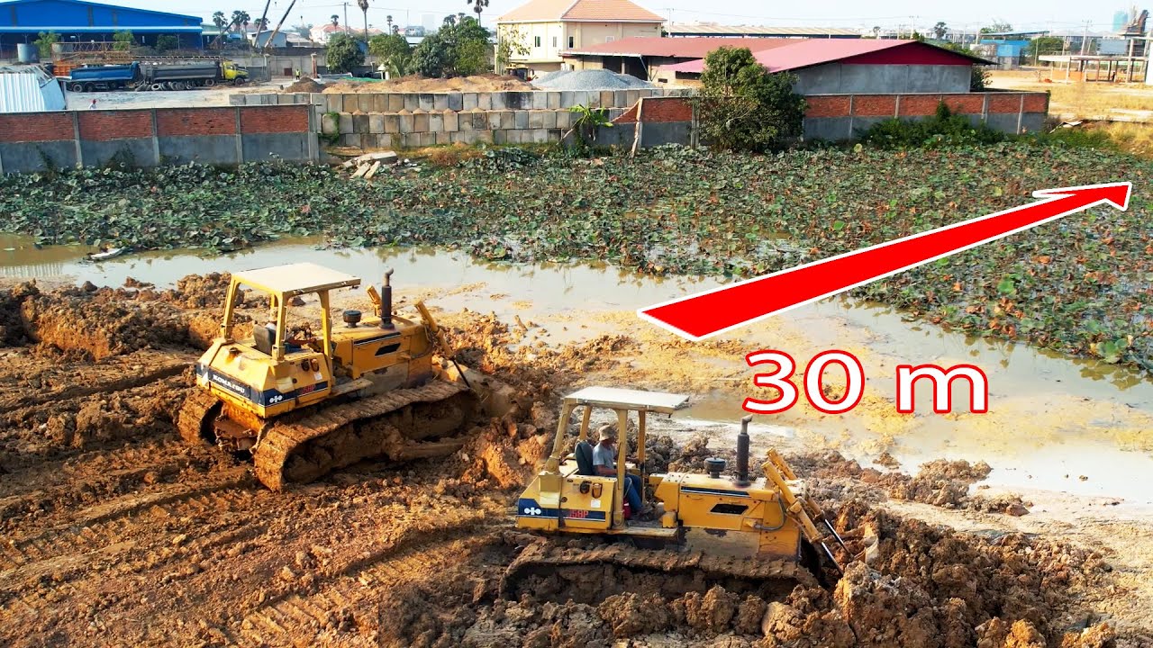 Development Equipment, Trucks & Komatsu Dozer push Soil mud Filling ...
