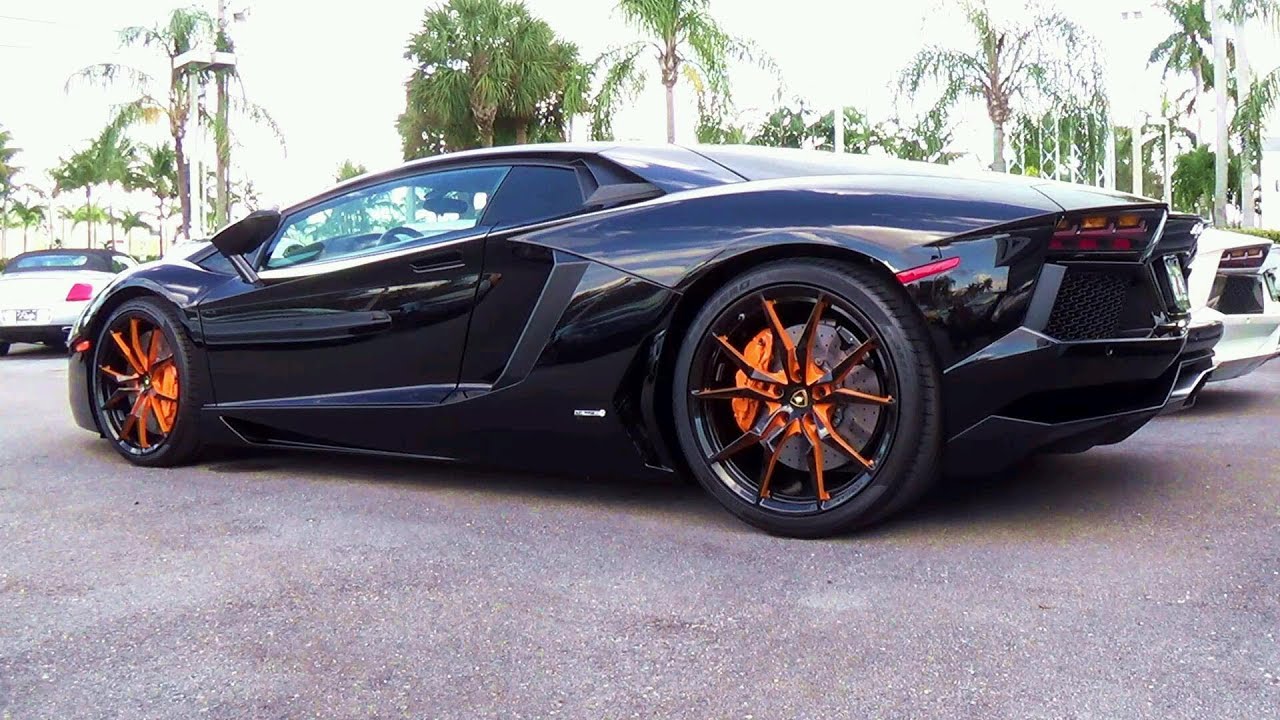 Awesome looking Black Lamborghini Aventsdor at Lamborghini Miami - YouTube