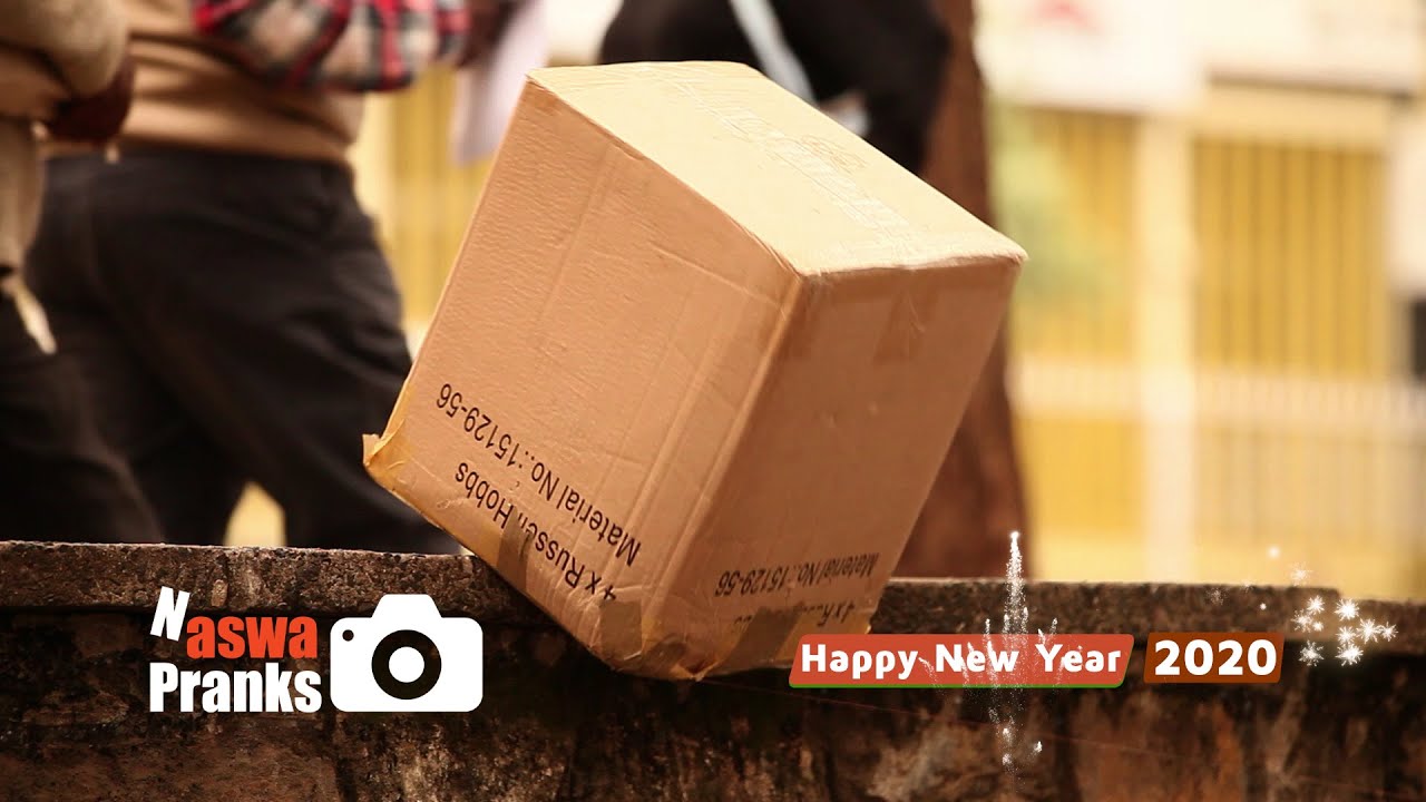 Dropping a box with fragile items. - YouTube