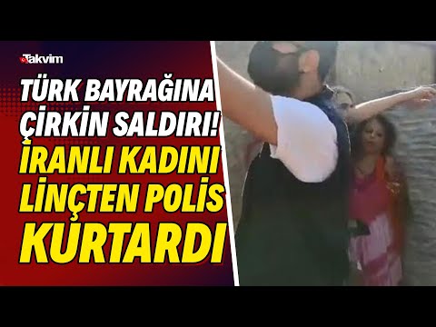 Türk bayrağına çirkin saldırı! Bayrağı yırtıp, üstüne bastı! İranlı kadını linçten polis kurtardı