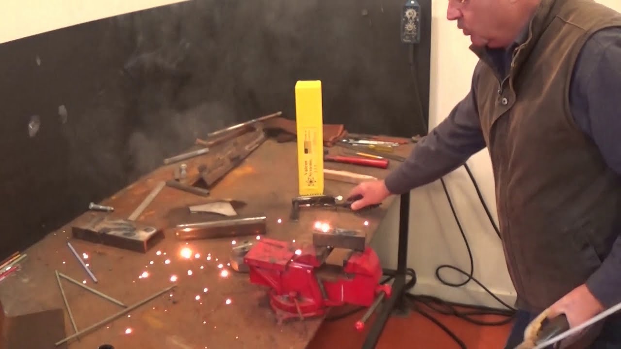Removing welds with a "welder's eraser" electrode - YouTube