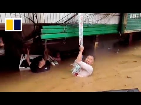 ‘Save her first’: Chinese man keeps pregnant wife above water for 3 hours in floods