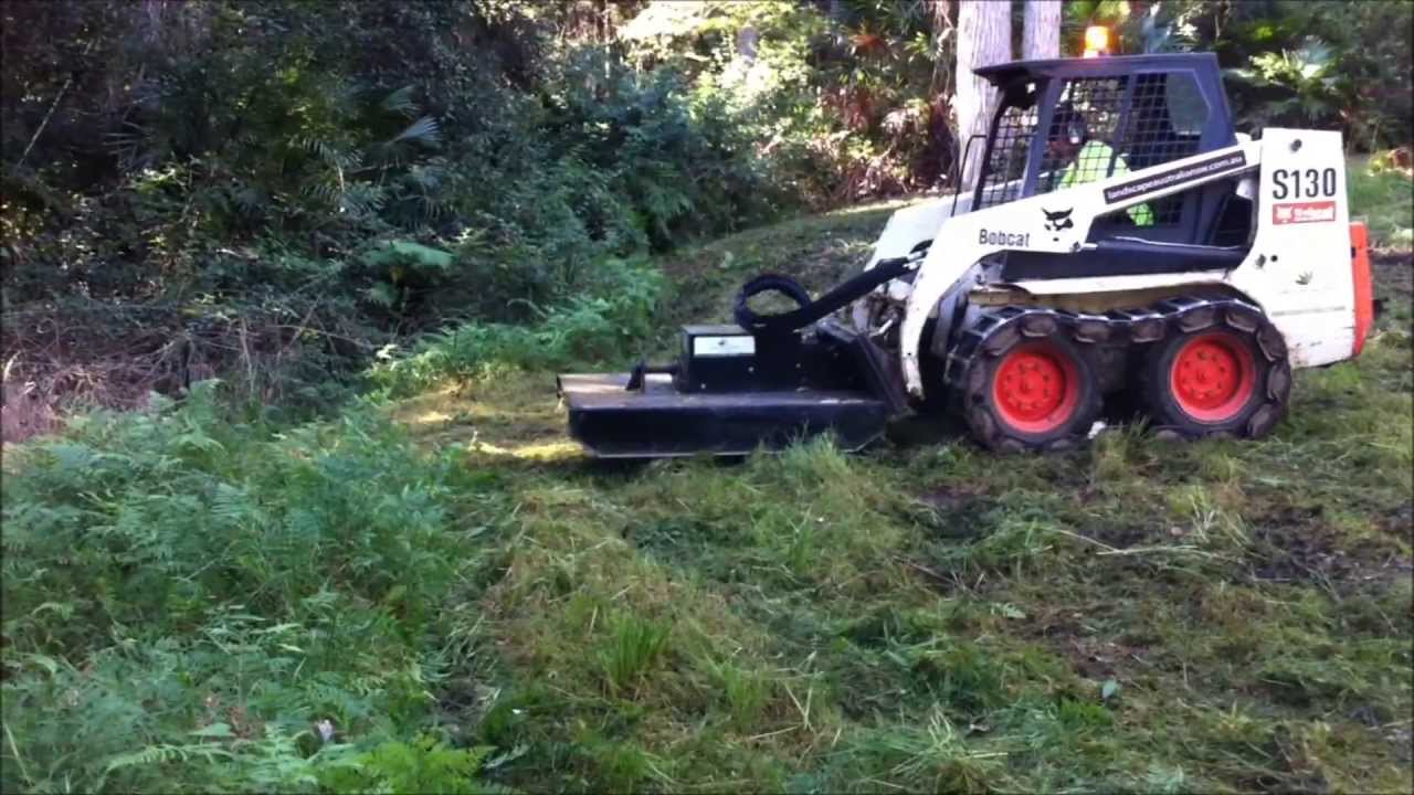 Landscape Australia NSW. Bobcat S130 wheel loader with slasher clearing ...