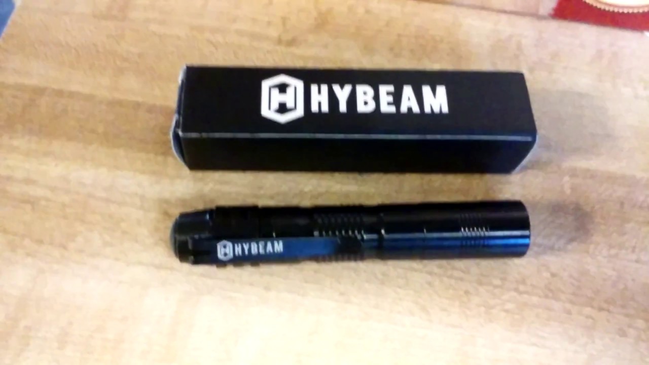 Hybeam Micro flashlight for a penny - YouTube