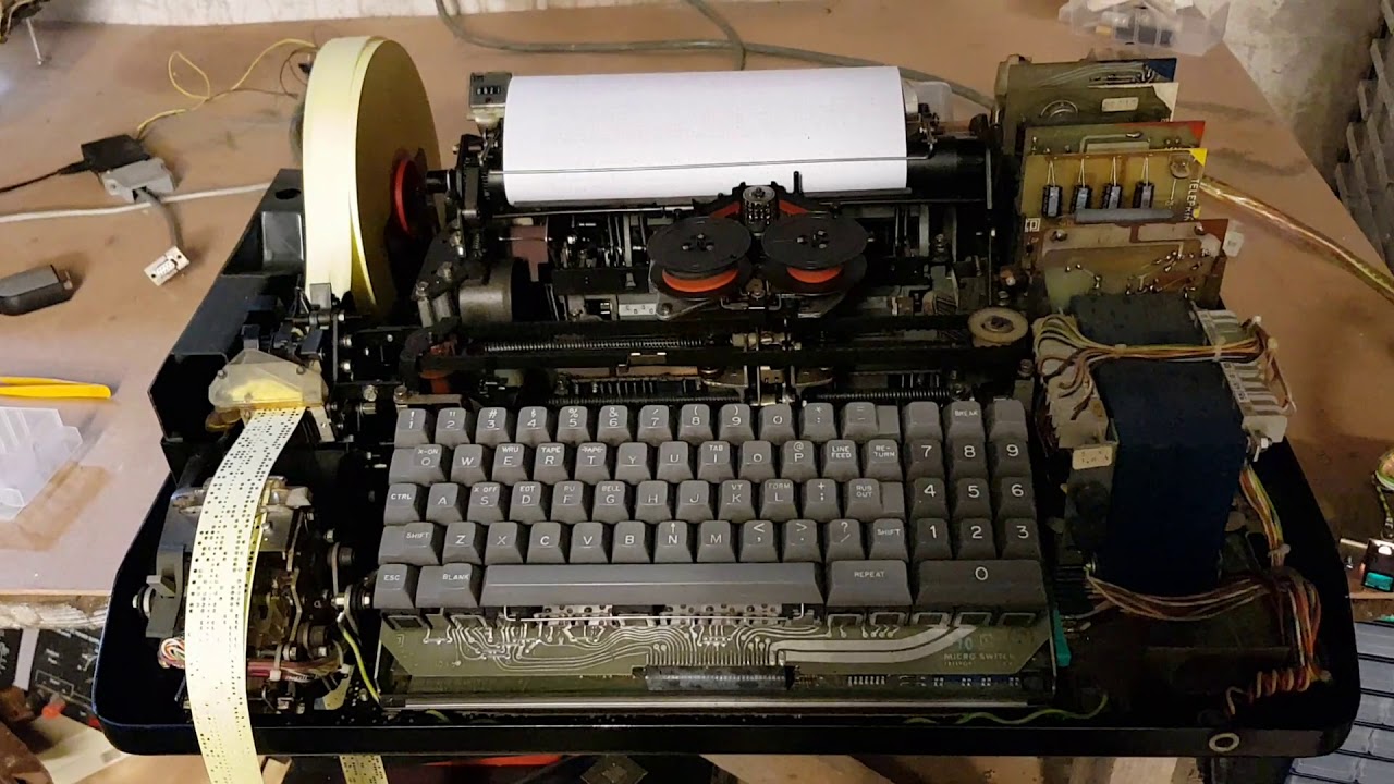 Teleprint 390 (modified Teletype 33 ASR) copying a paper tape - YouTube
