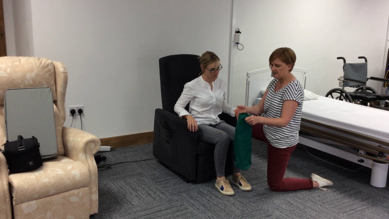 Reposition back in a chair with a slide glove - YouTube