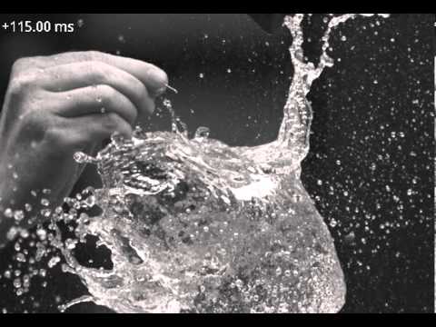 Water balloon popping in slow motion (20000 FPS) - YouTube