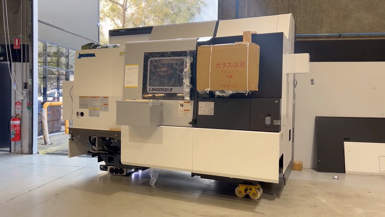 OKUMA LB4000 EXii MY arrival and unloading - YouTube