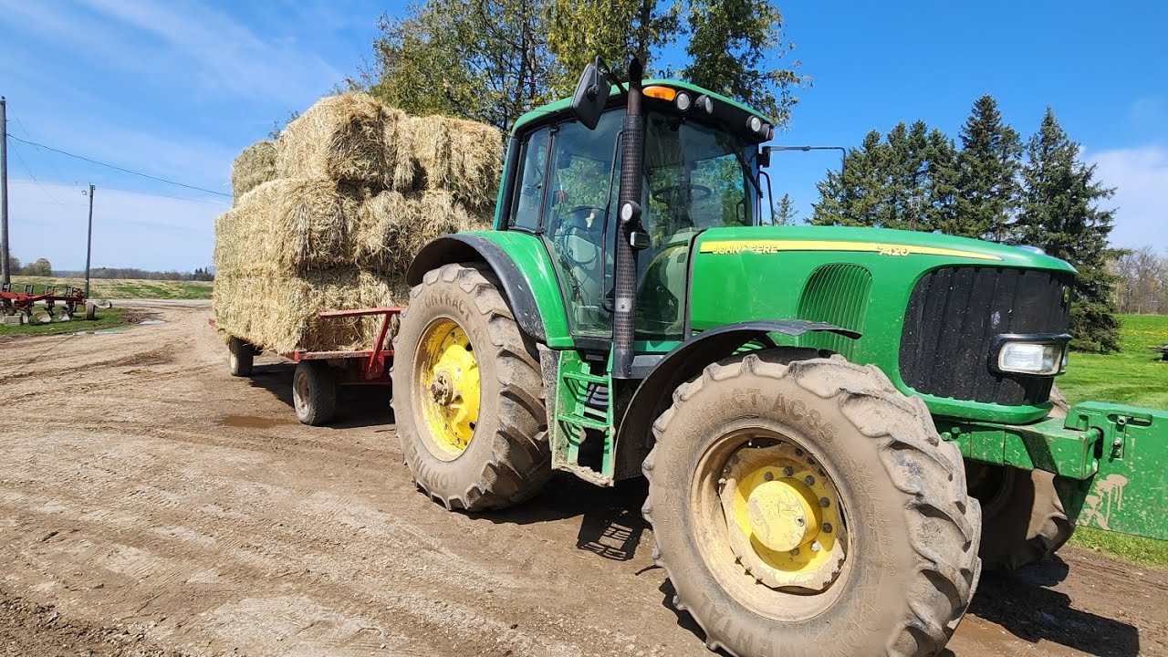 Hauling hay with the 7420! - YouTube