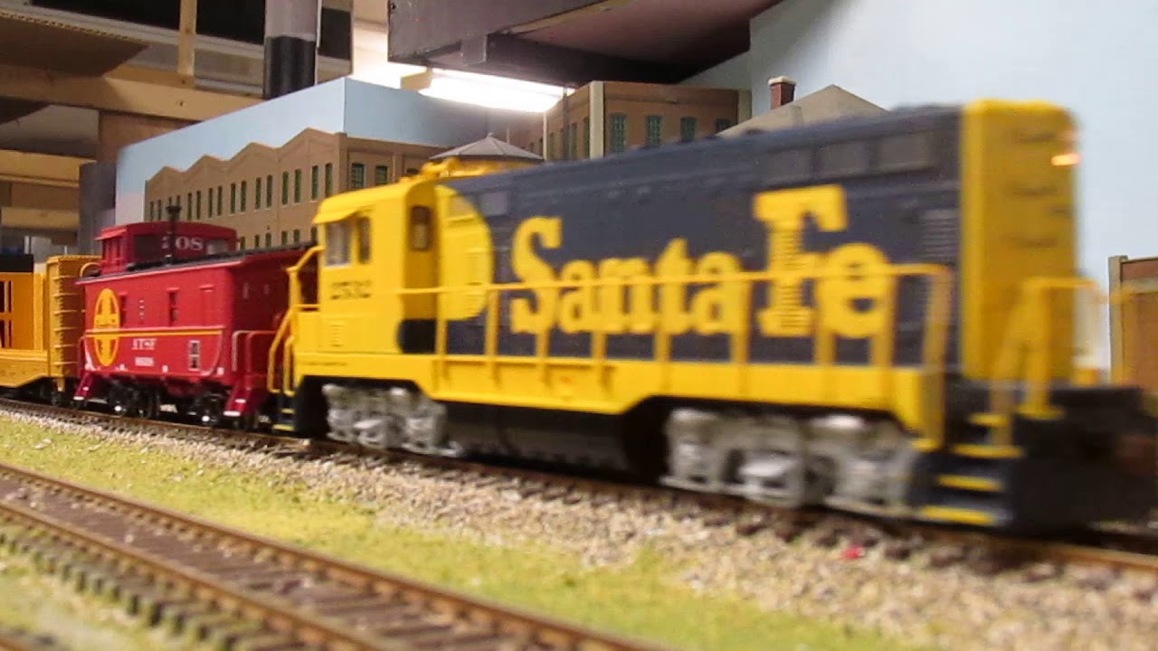 A CF 7, pulls a short Santa Fe local freight train. - YouTube