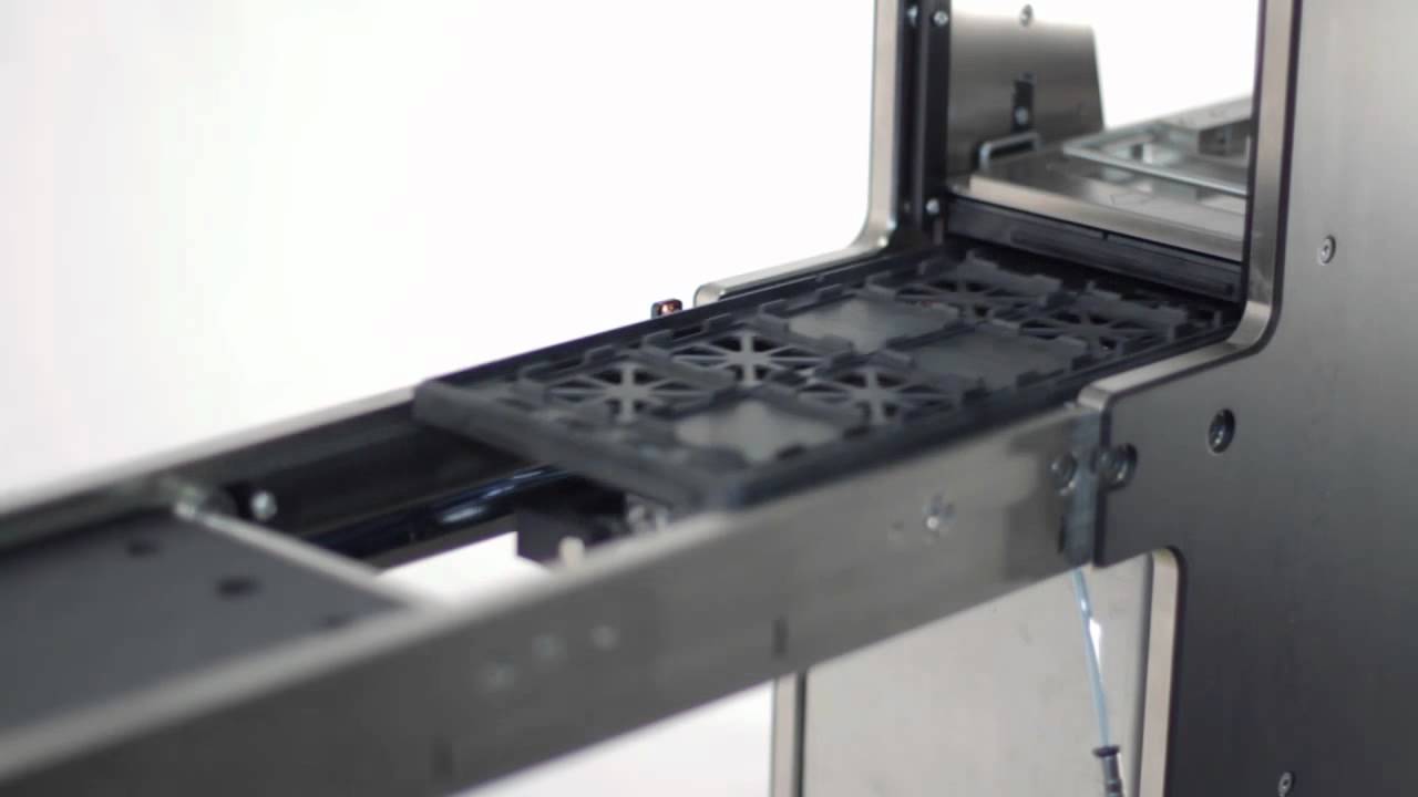 Random Access Matrix Tray Feeder by Quasys - YouTube