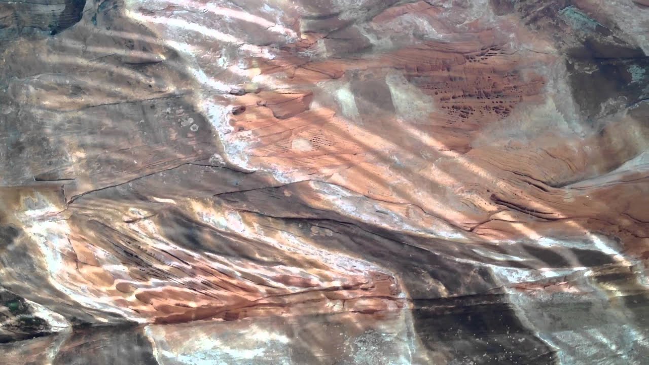 Water reflection on a rock wall in Sedona - YouTube