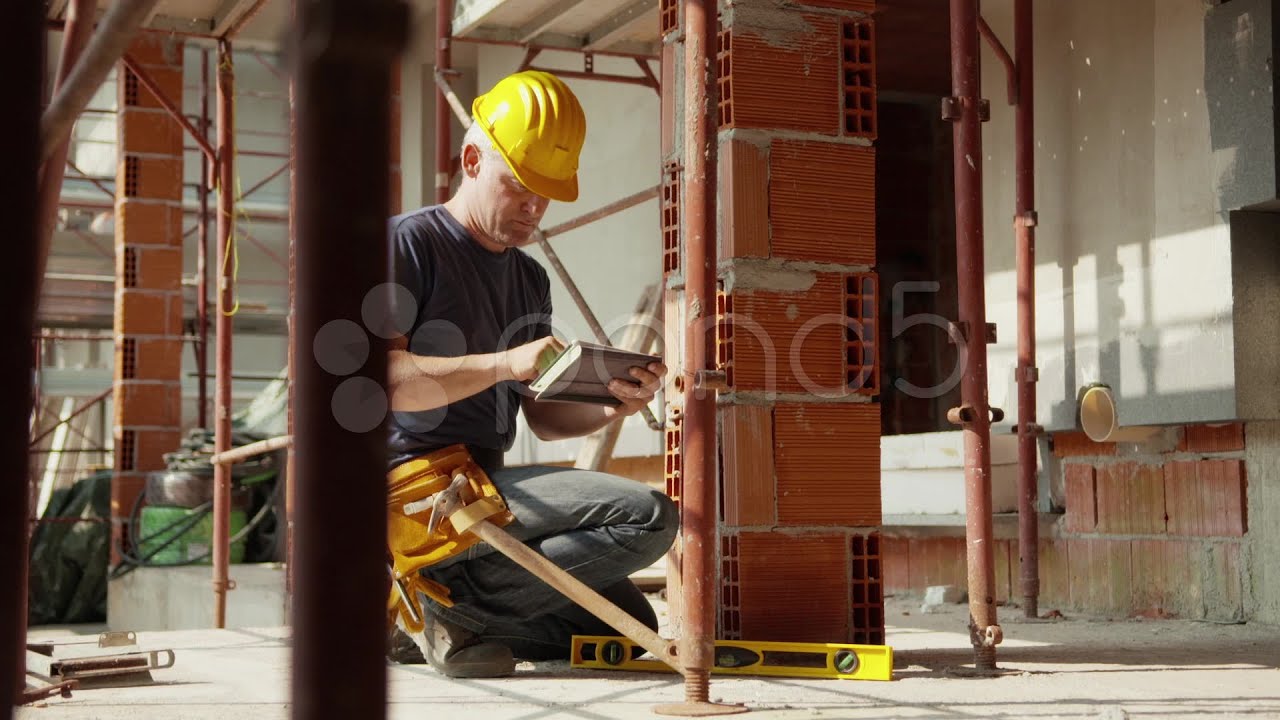 Construction Worker And New Building, Man Using Digital Tablet Computer ...