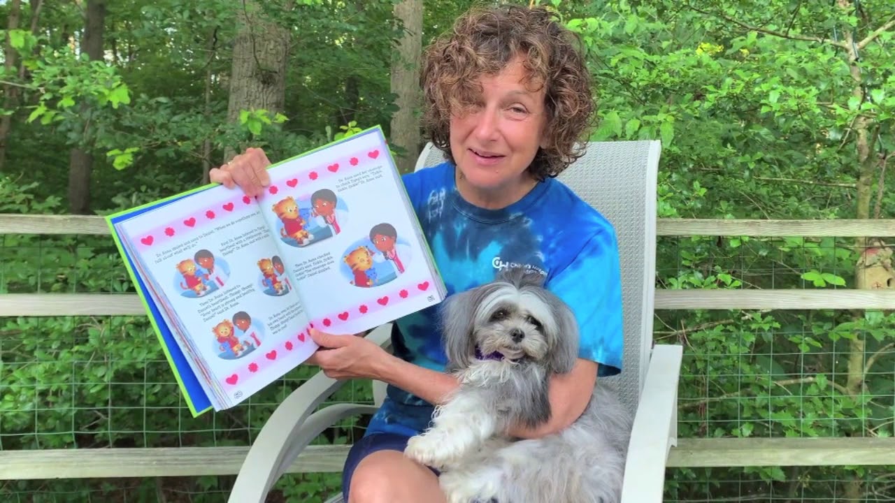 Dr. Flaura Winston and Dobby read "Daniel Tiger Visits the Doctor ...