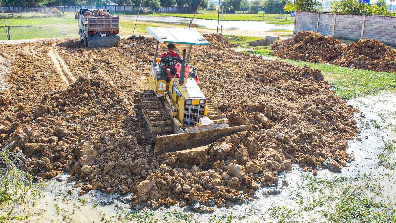 Operator Specialize Push Clearing Dirt Using Small Bulldozer Push And ...