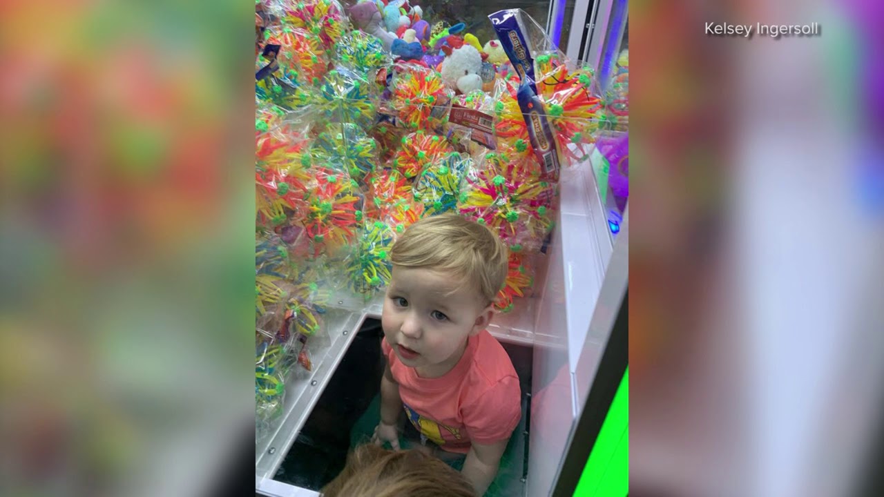 Boy stuck in claw machine - YouTube