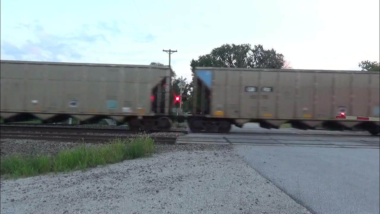 BNSF 6048 leads and empty coal train at Pacific Junction, Iowa. - YouTube