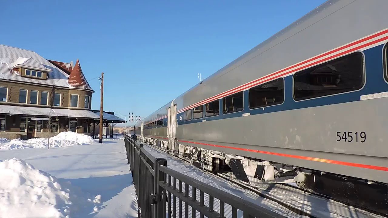 Amtrak #26 leads a passenger train westbound from Durand - YouTube