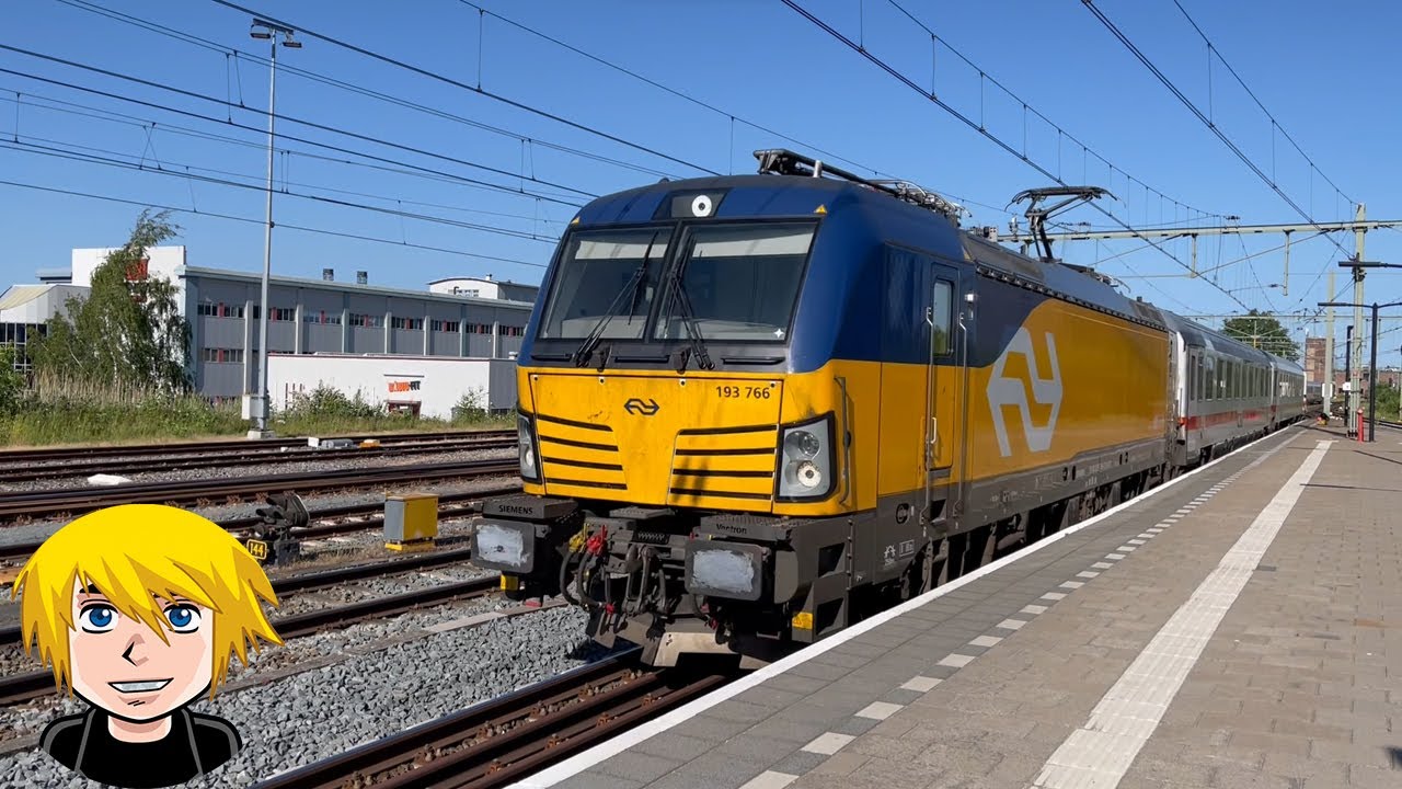 IC Berlijn met Vectron in Flow kleurstelling komt aan op station ...