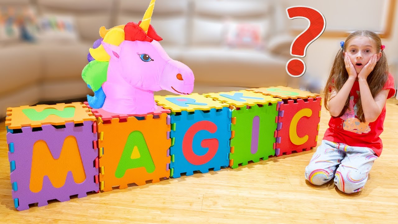 Alicia's funny adventure with magic boxes. Alicia plays with ABC puzzle ...