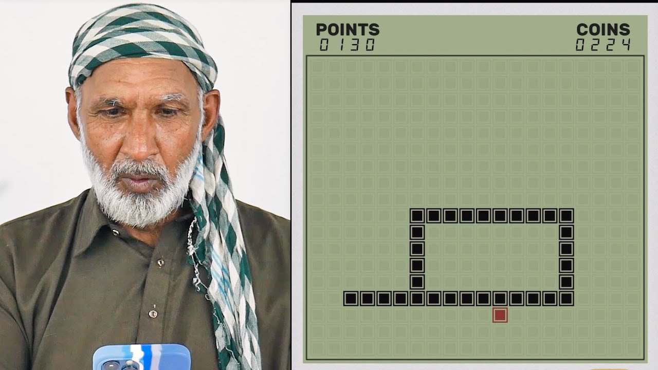 Epic First Reaction! Tribal People Play Snake Game - YouTube