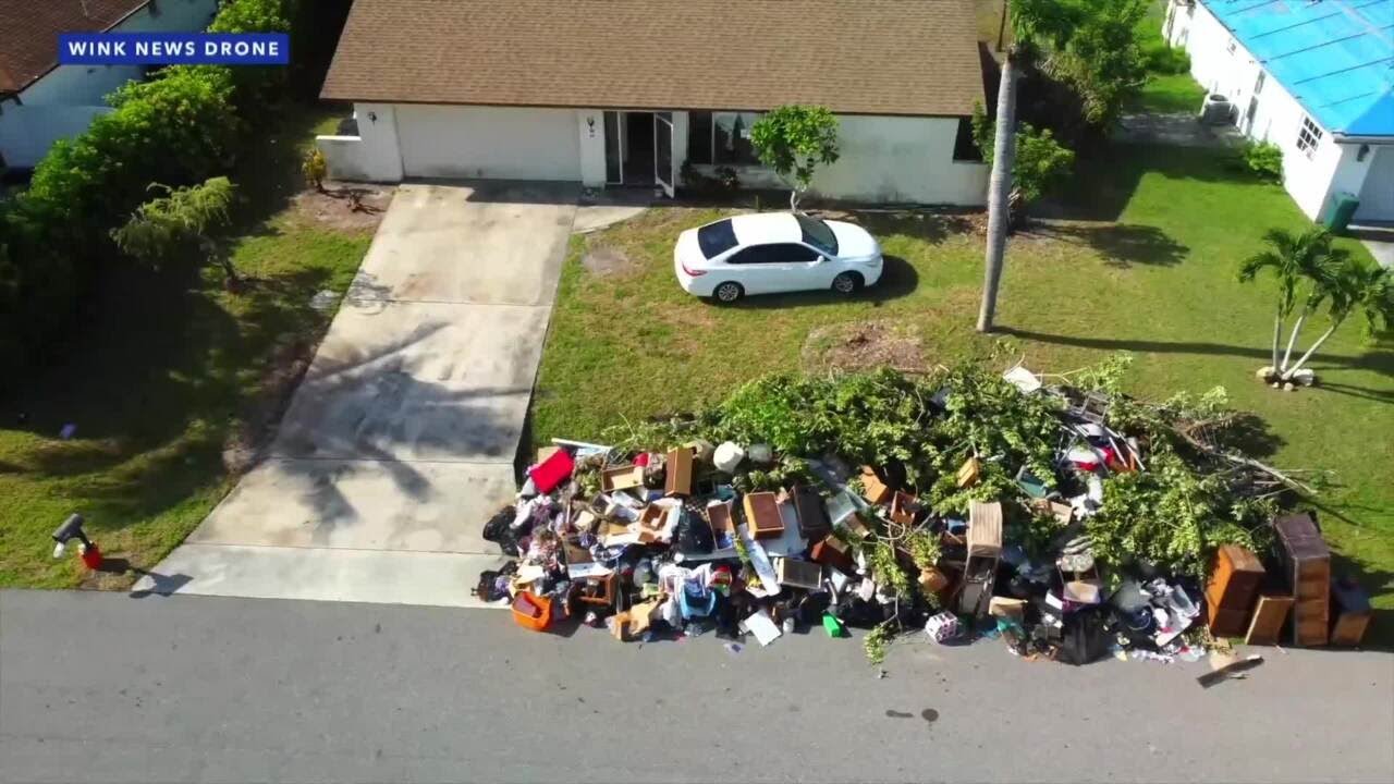 Neighbors upset over overflowing garbage outside foreclosed home in ...