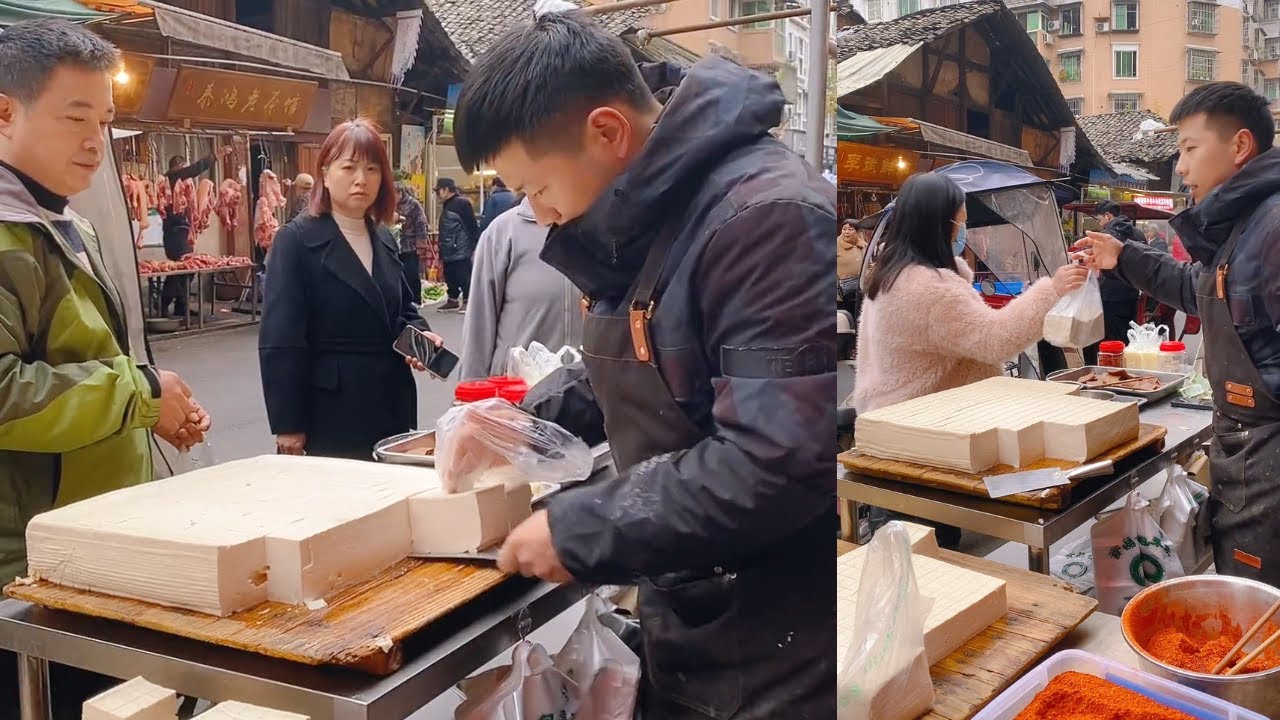 The stall sells tofu, which is freshly made and sold on December 15st ...