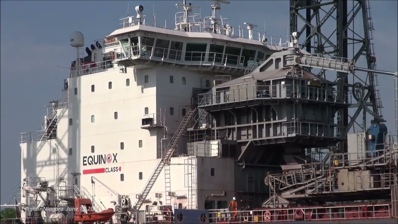 Ship ALGOMA NIAGARA uses landing boom to lower 2 crew to shore, Welland ...