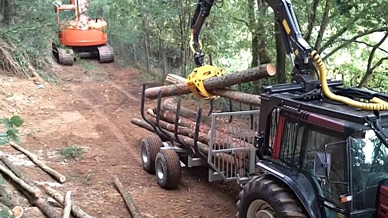 Botex 570 loader working on hill - YouTube